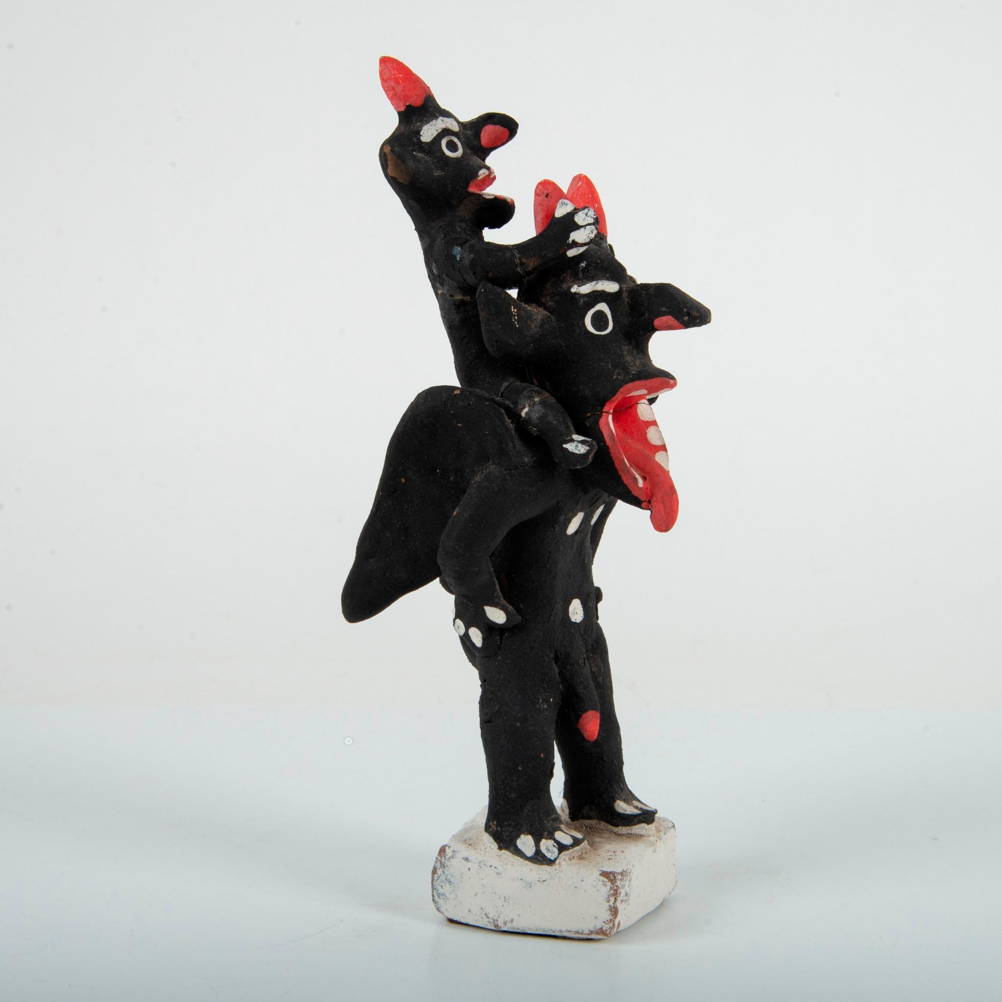Painted Clay Statuette Winged Demon And Child On Shoulders Auction